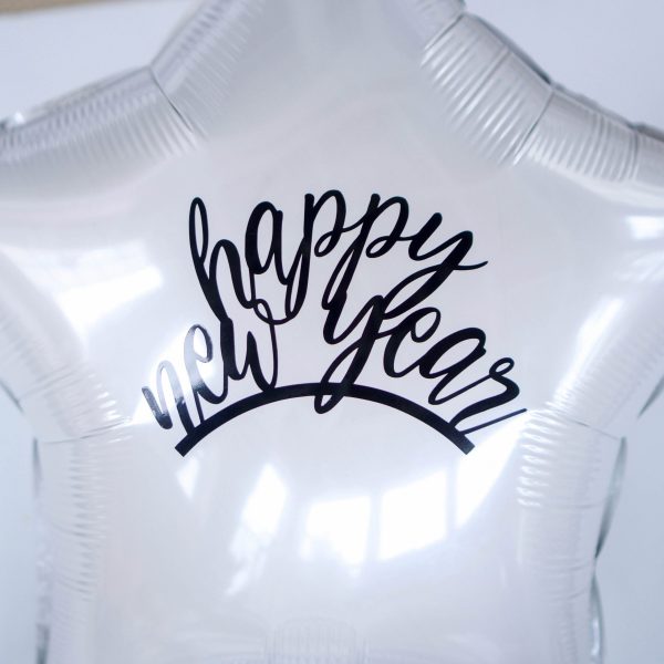 How To Apply Adhesive Vinyl To Balloons For An Easy New Years Party ...